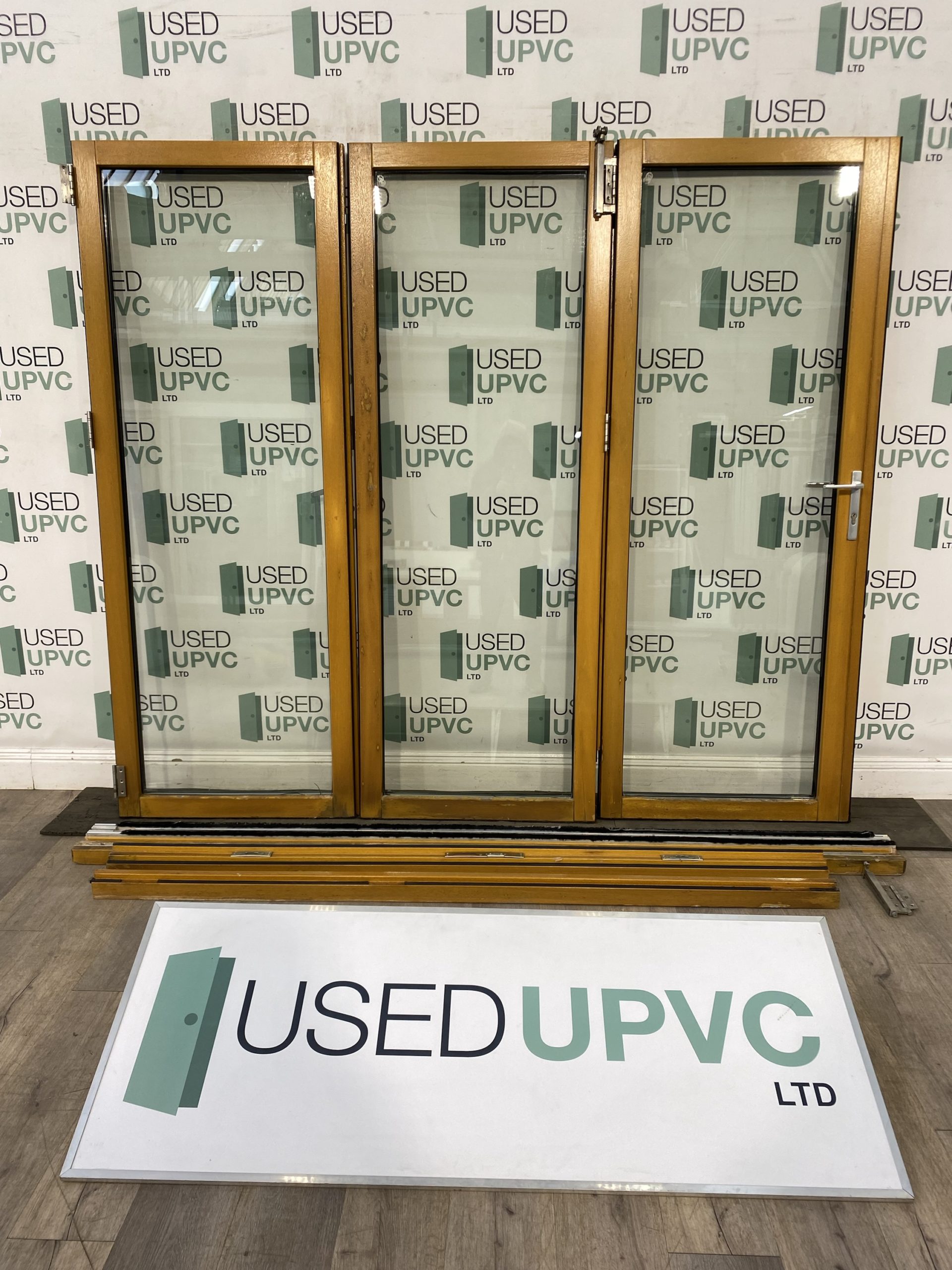 Folding Sliding Timber Varnished Bi-Folding Doors | Green doors