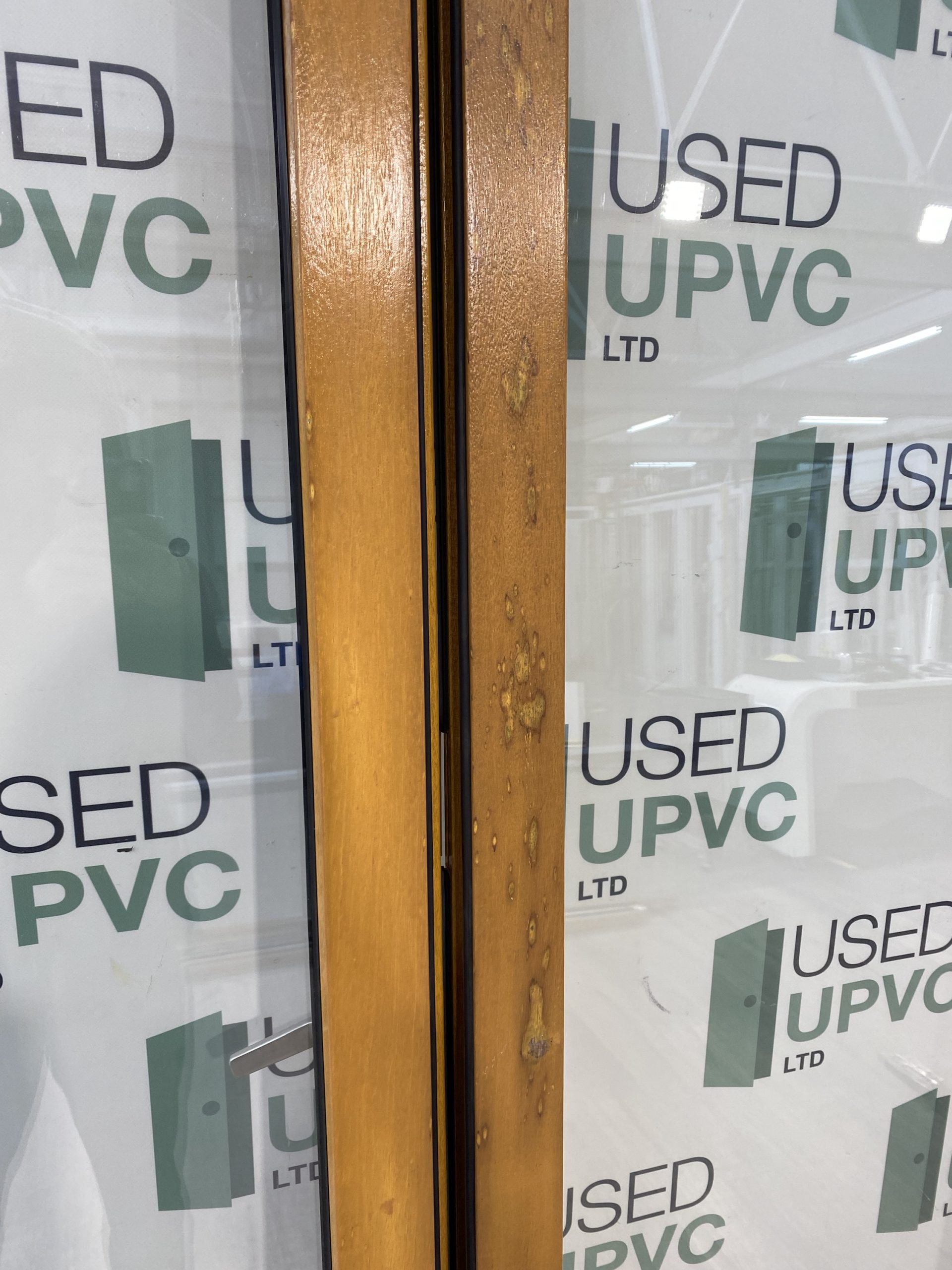 Folding Sliding Timber Varnished Bi-Folding Doors | Green doors