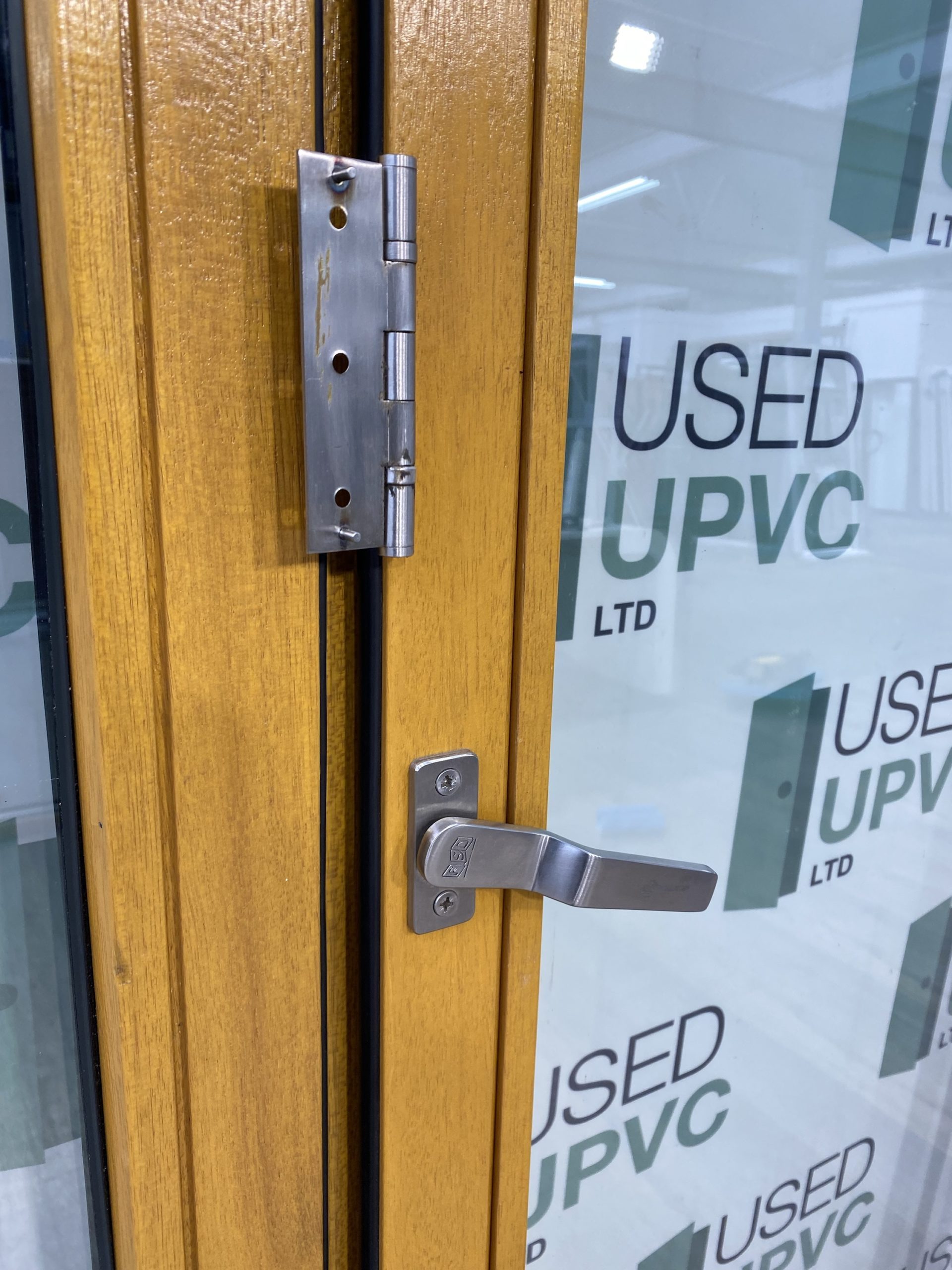 Folding Sliding Timber Varnished Bi-Folding Doors | Green doors