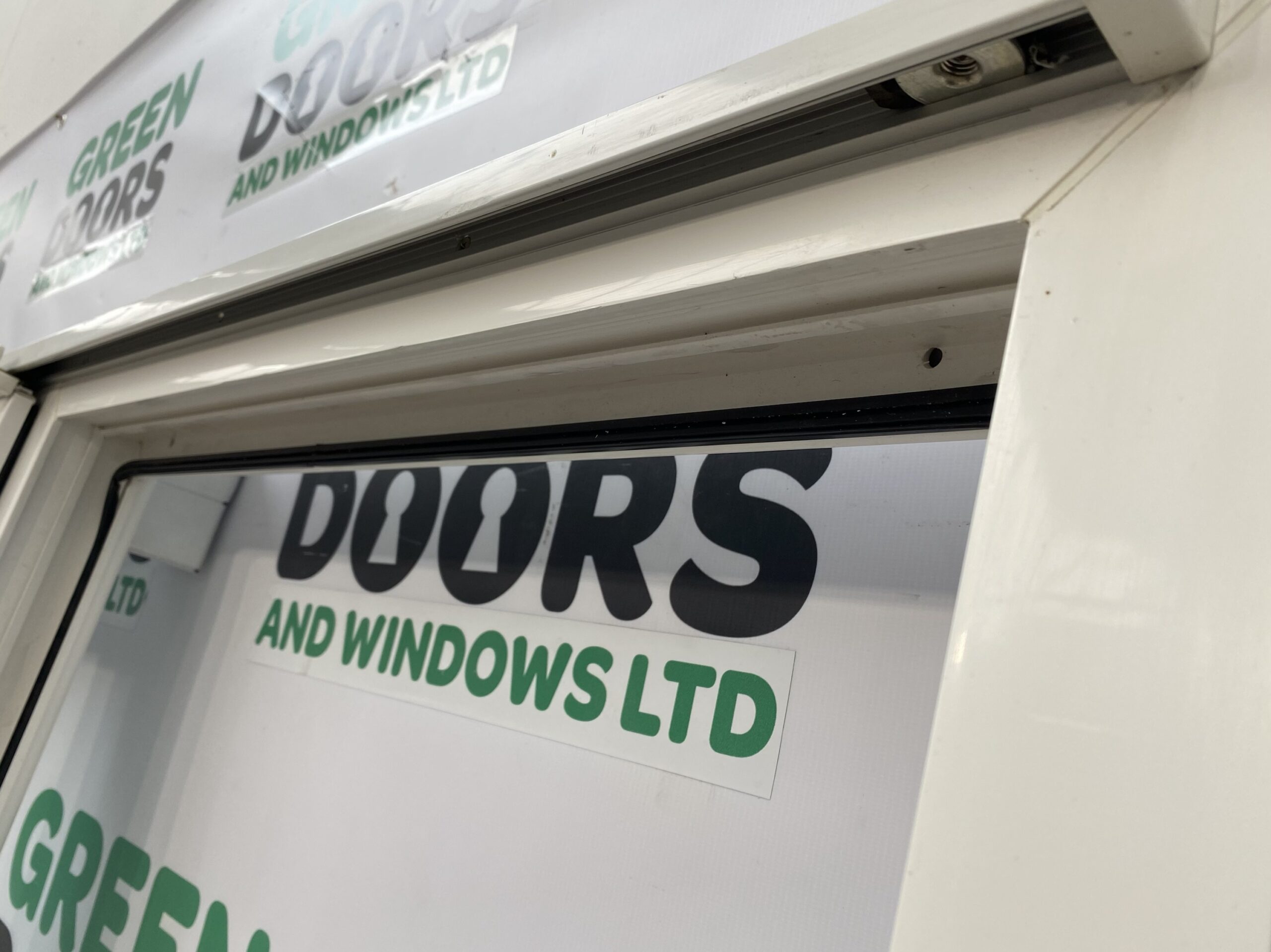 uPVC White Tilt & Slide Back Door | Green doors
