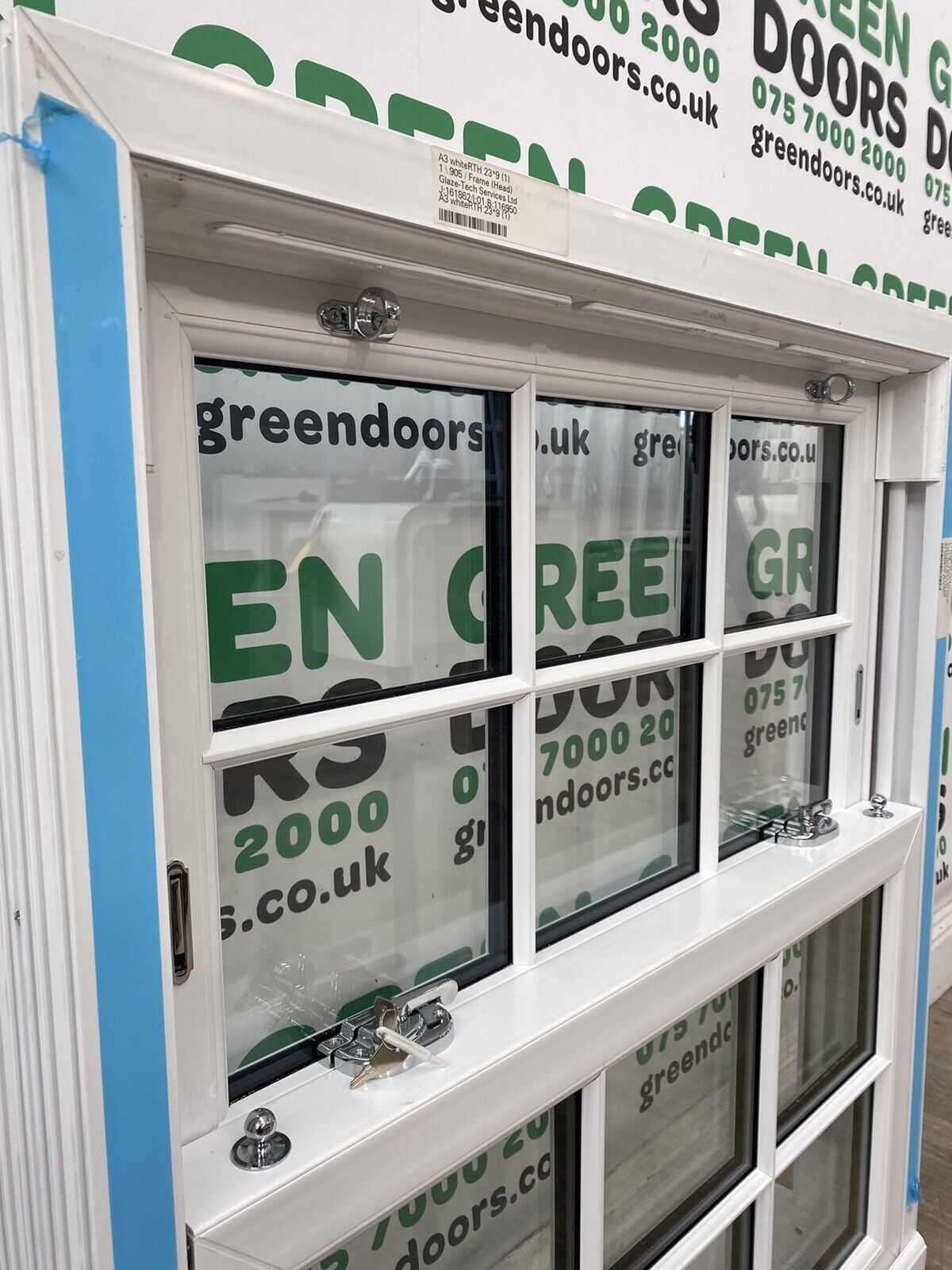 uPVC White Box Sash Window | Green doors