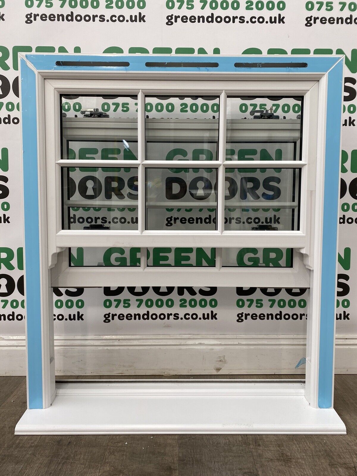 uPVC White Box Sash Window | Green doors
