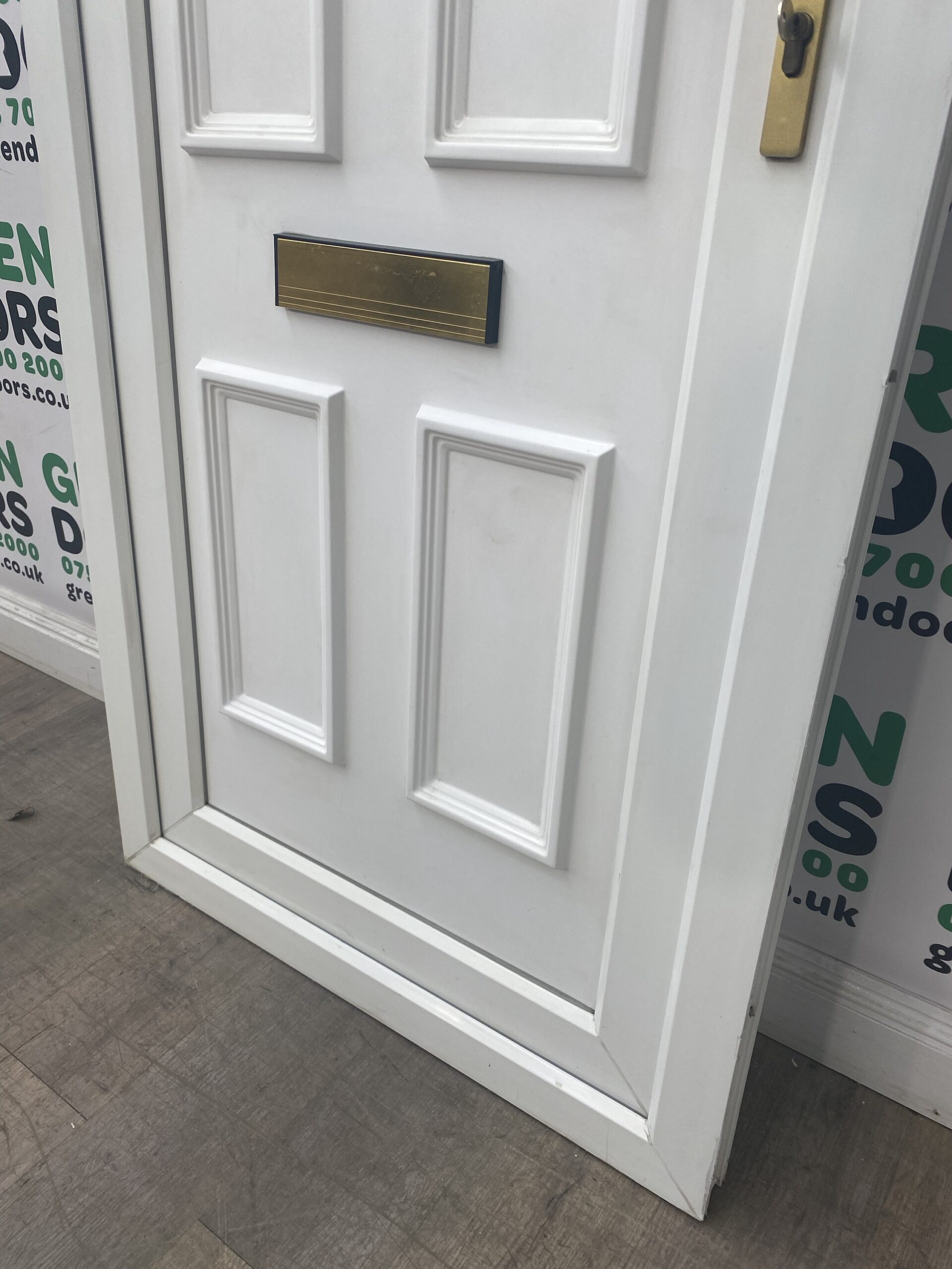 'REHAU' White uPVC Front Door | Green doors