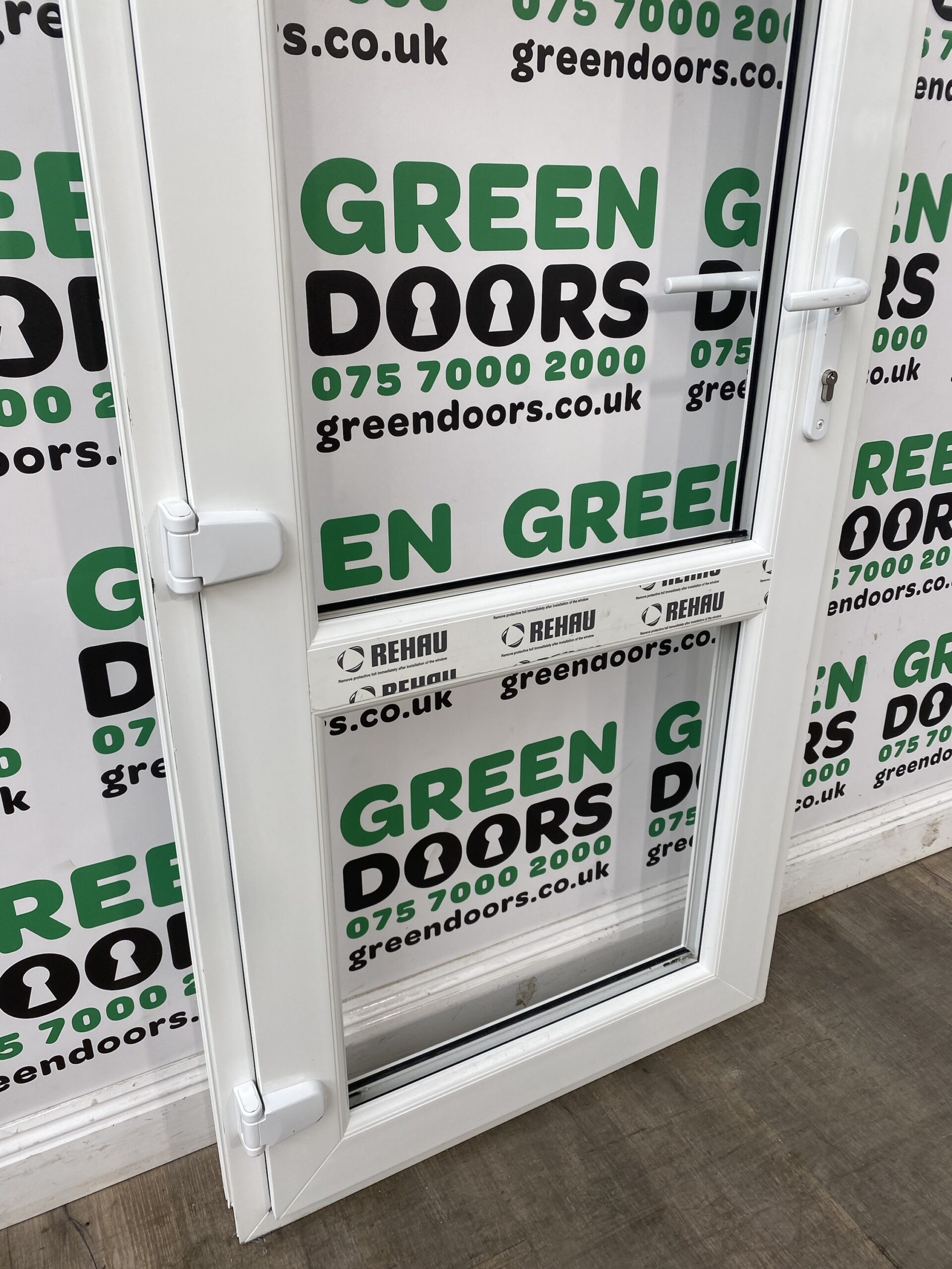 'Rehau' uPVC White Back Door | Green doors