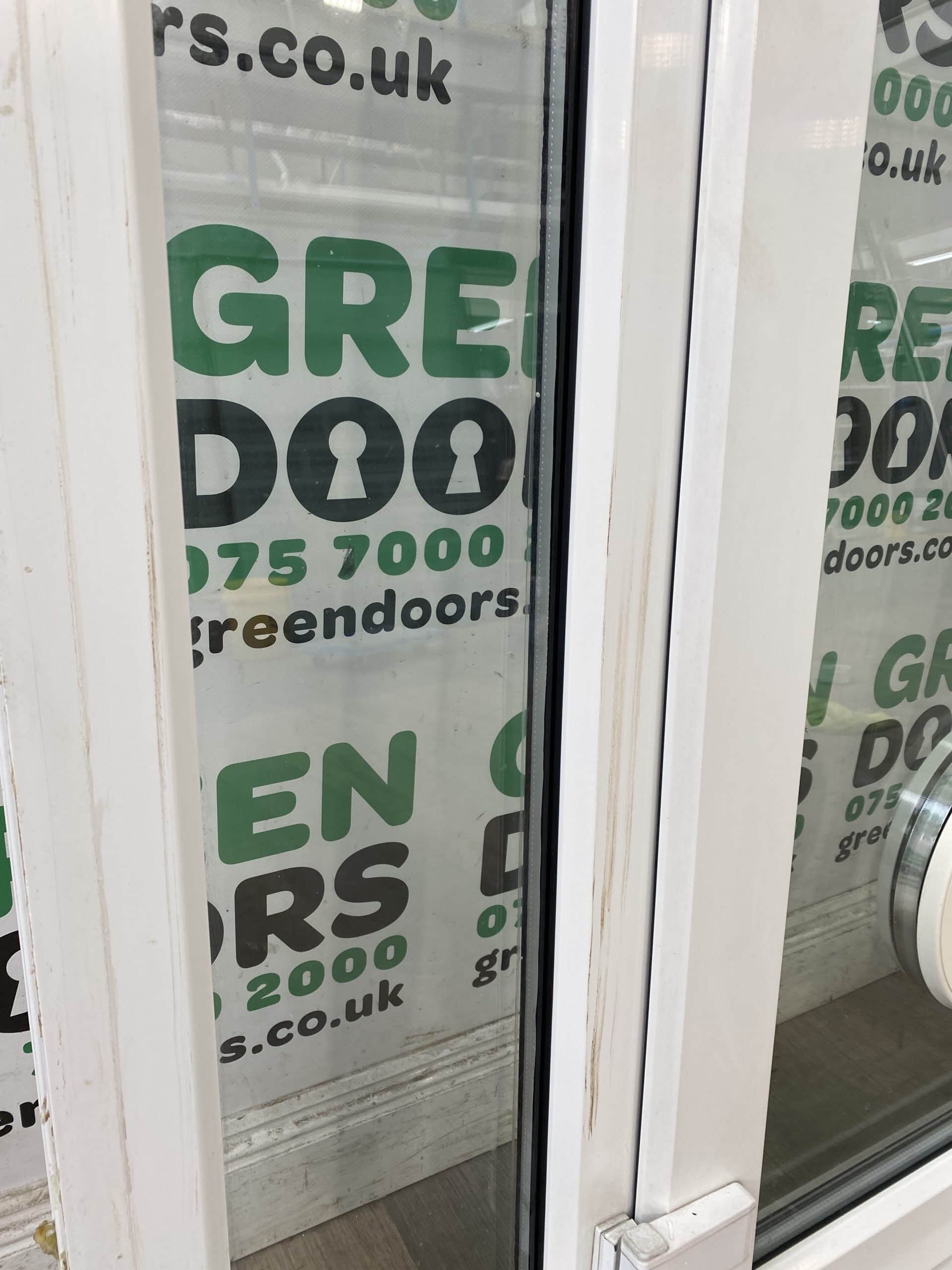 White uPVC French doors | Green doors