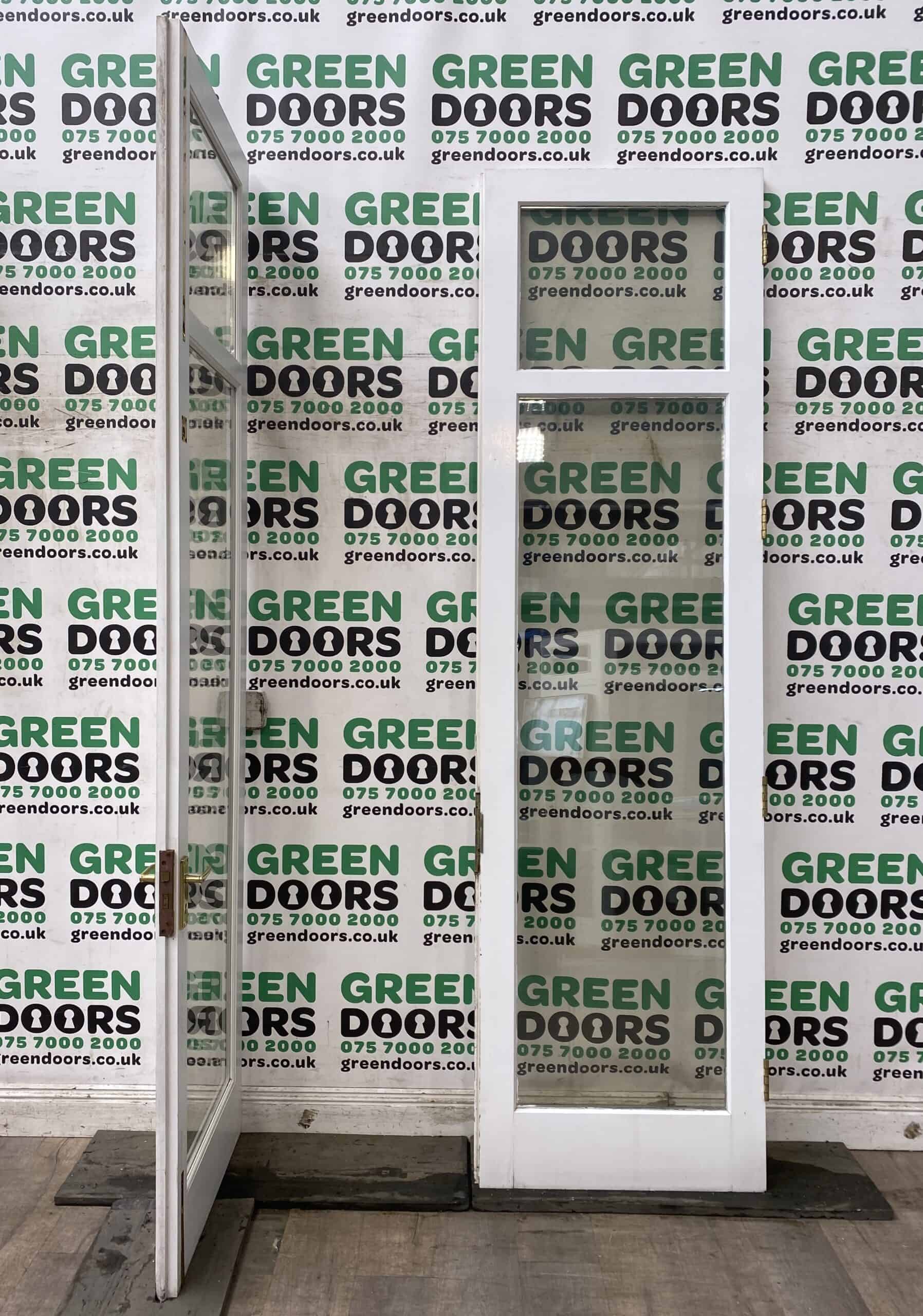 White Wooden French doors | Green doors